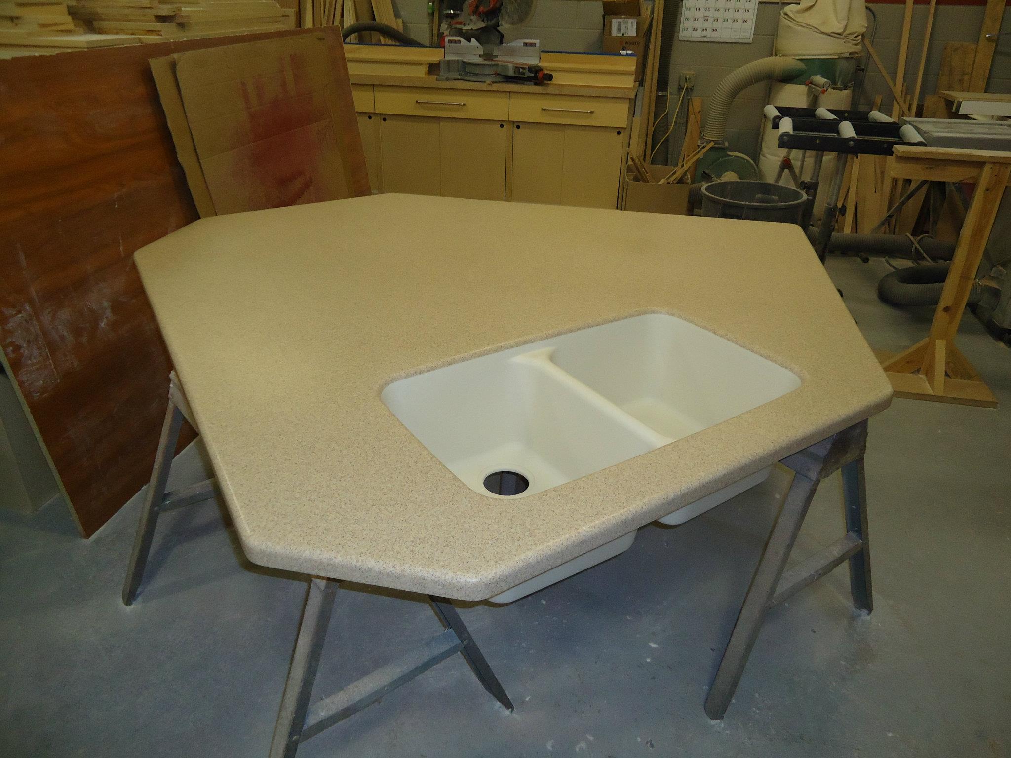 Solid Surface Tops – Cabinet Fabrications Inc.